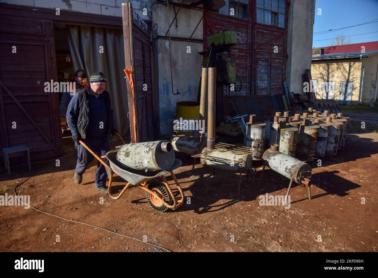 Workers of one of the Lviv utility companies take out a ready-made ...