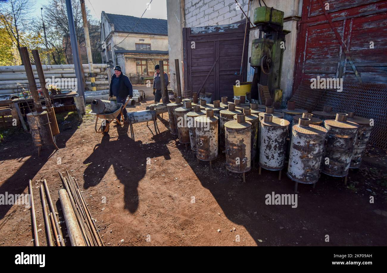 Workers of one of the Lviv utility companies take out a ready-made ...
