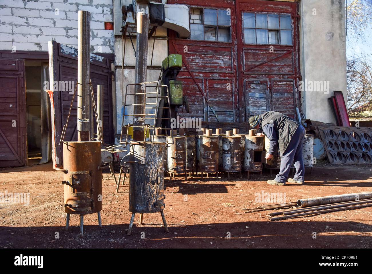 A worker of one of the Lviv utility companies checks ready-made special ...