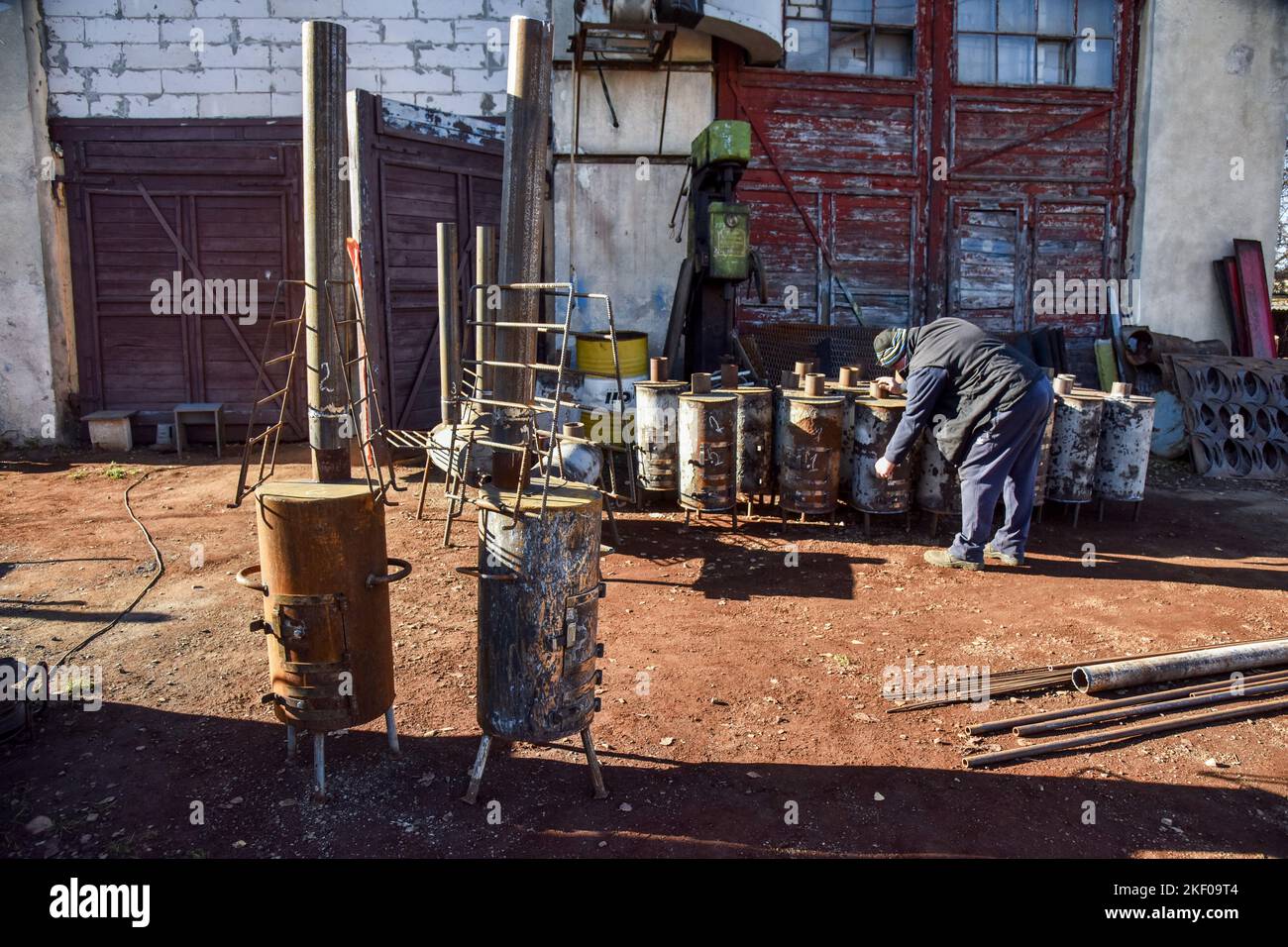 A worker of one of the Lviv utility companies checks ready-made special ...