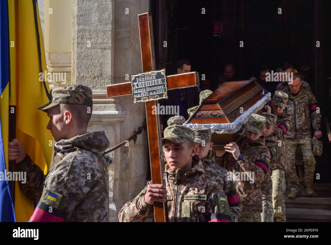 Lviv, Ukraine. 18th Oct, 2022. Soldiers carry coffins with the bodies ...