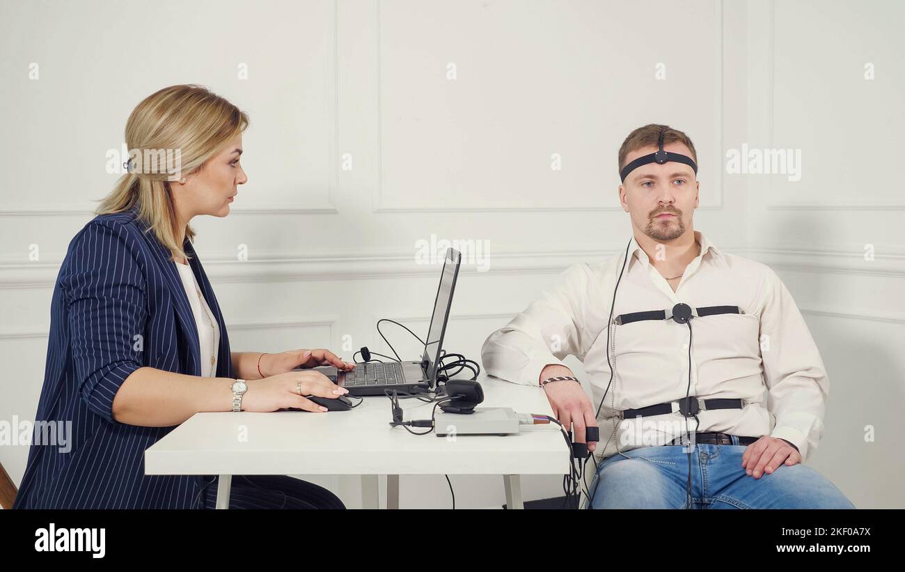 Man on Polygraph Test Stock Photo - Alamy