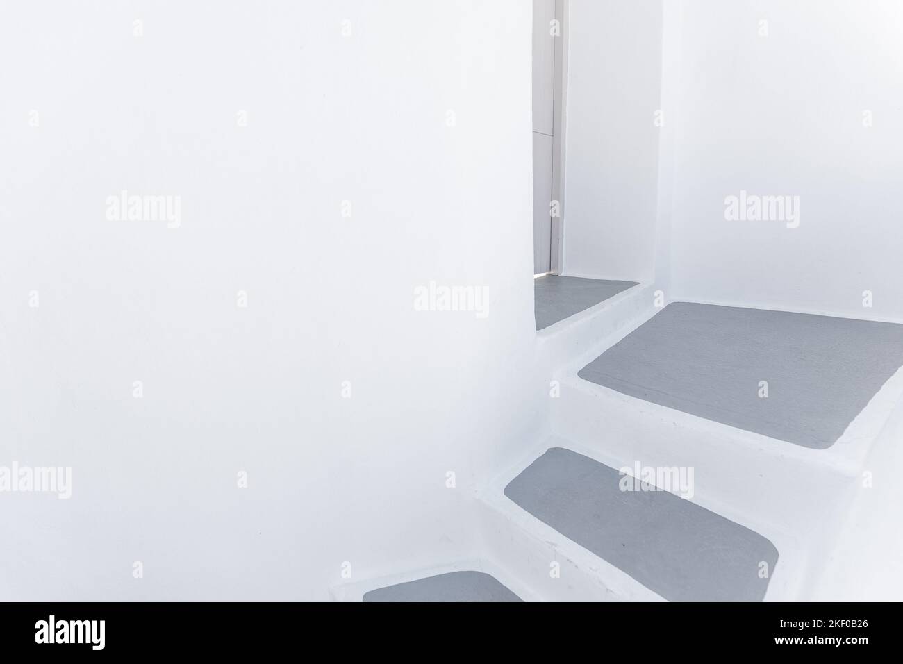 Empty stone stairway near white wall, abstract closeup in Santorini ...