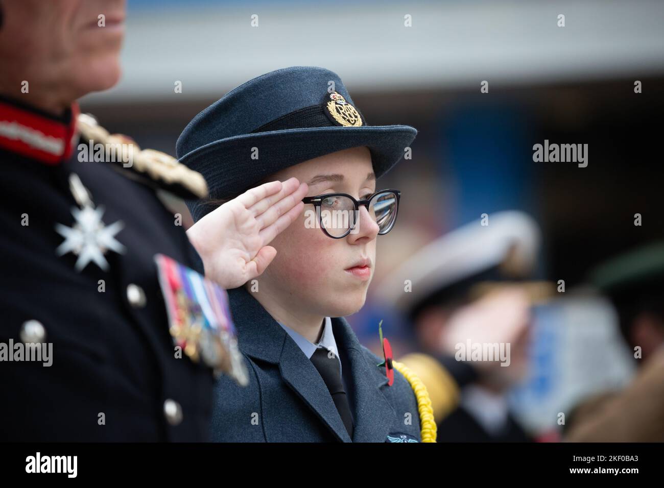 A young Cadet salutes during a Wreath laying ceremony at the War ...