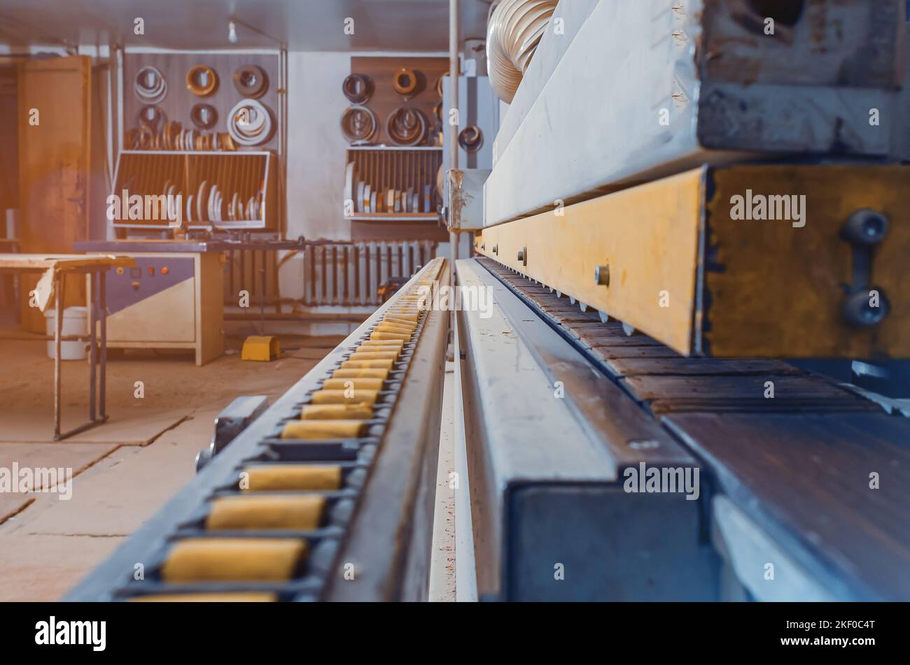 Edge banding machine operating in hi-res stock photography and images ...