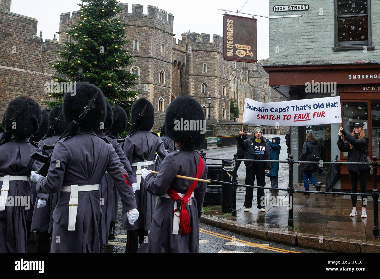 Windsor, UK. 15th November, 2022. PETA supporters hold a banner reading ...