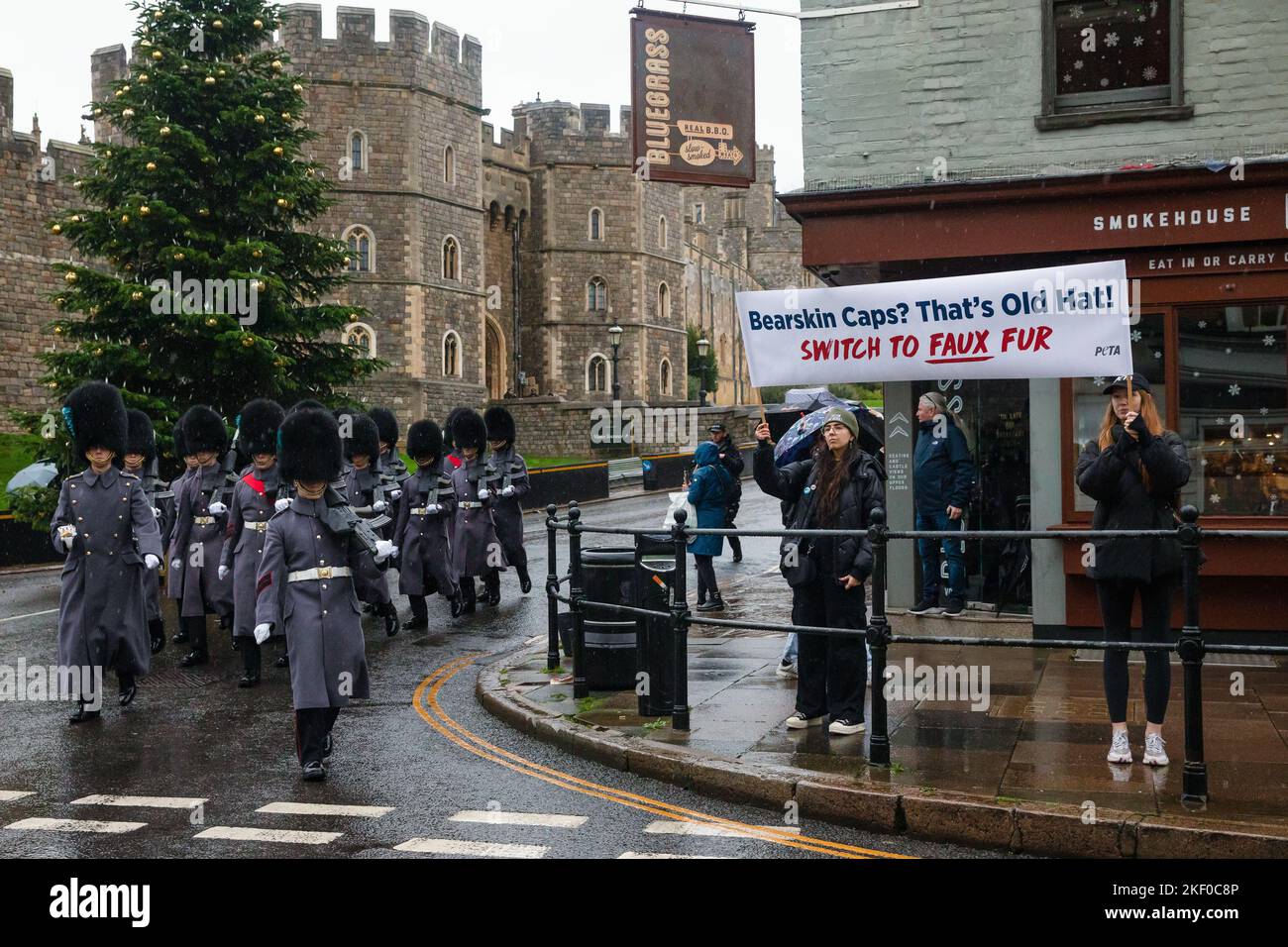 Windsor, UK. 15th November, 2022. PETA supporters hold a banner reading ...