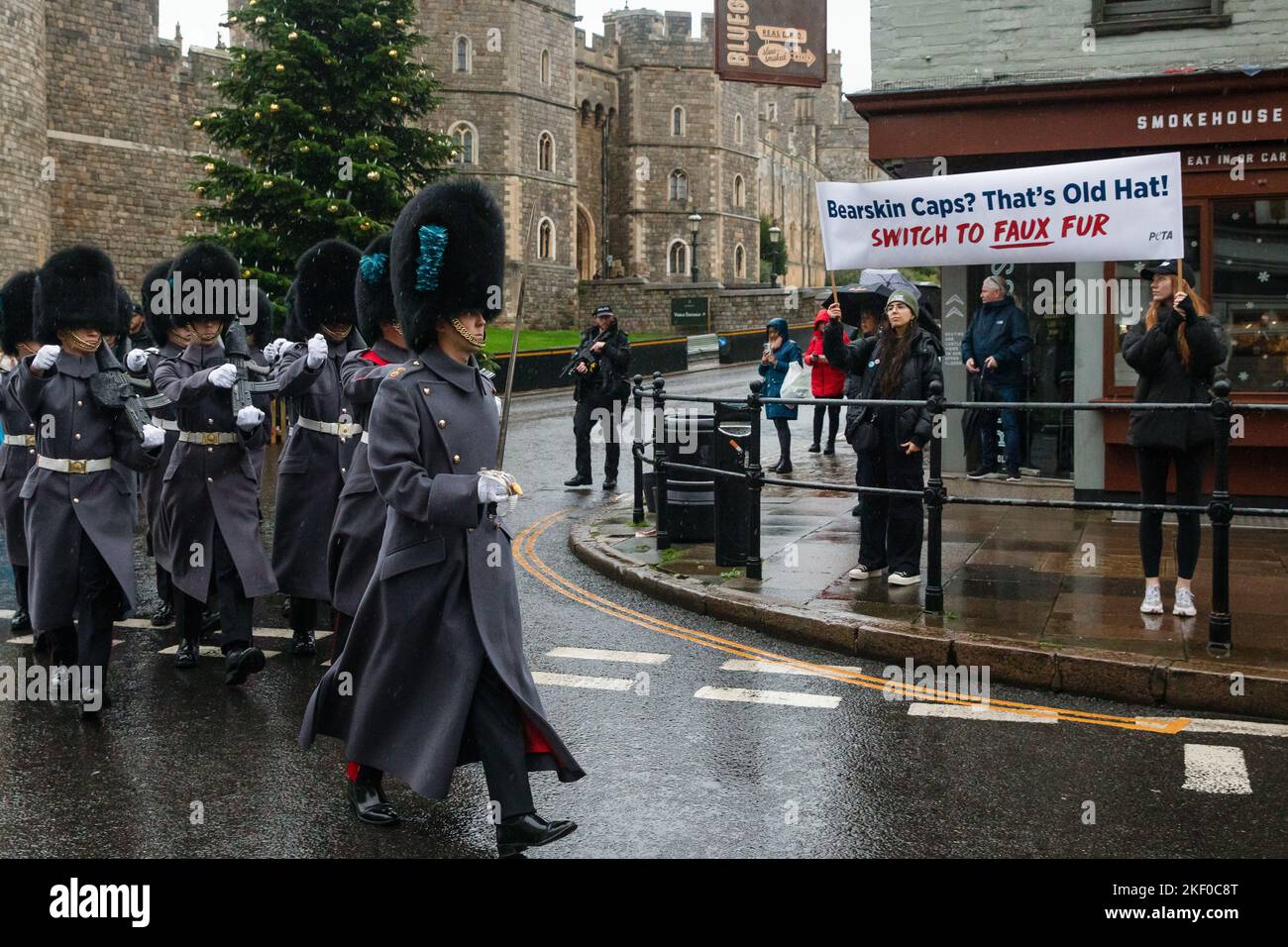 Windsor, UK. 15th November, 2022. PETA supporters hold a banner reading ...