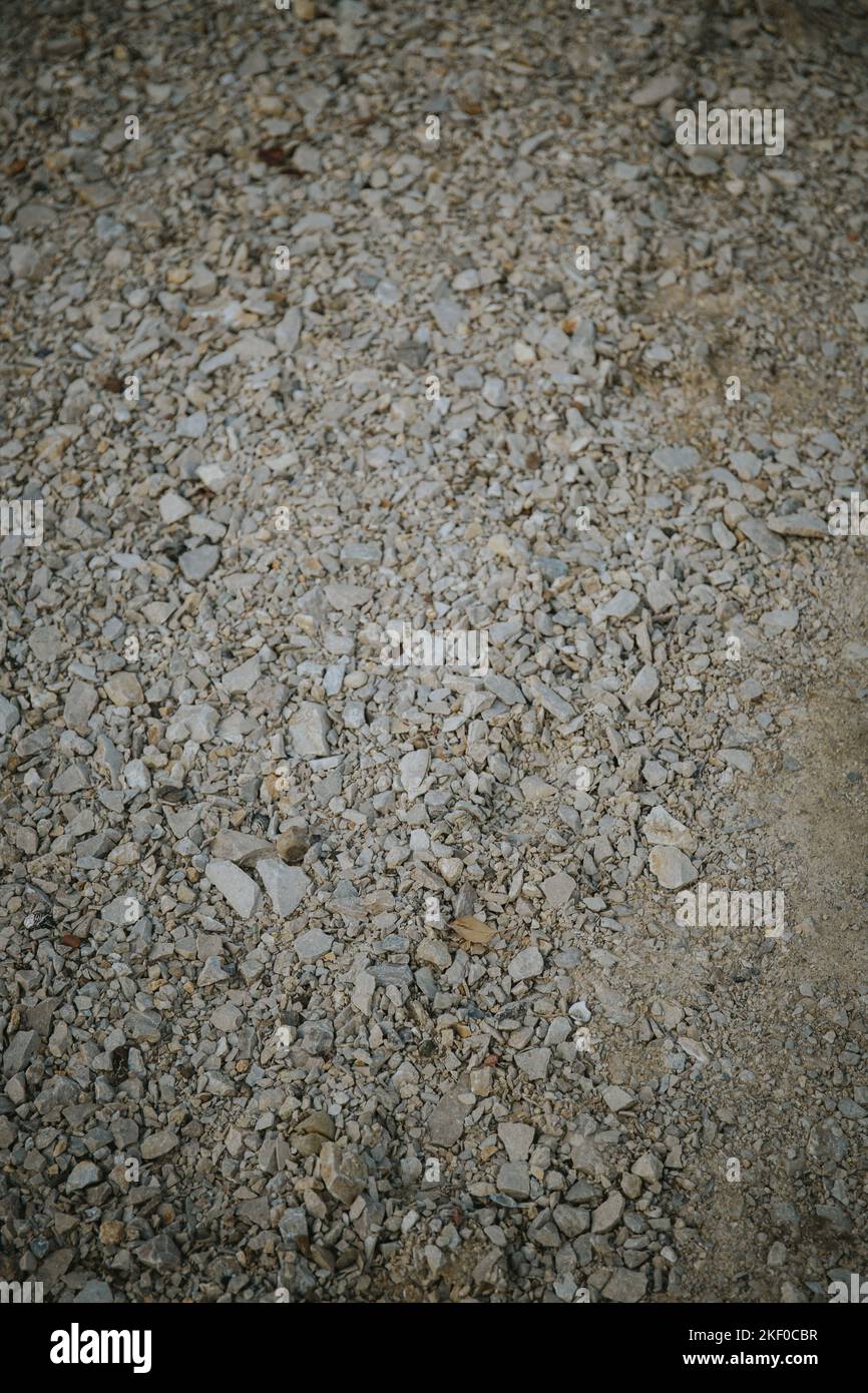 A top view of pebbled ground texture Stock Photo - Alamy
