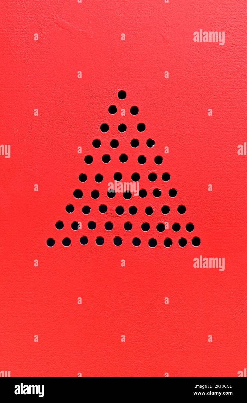 Triangle shaped perforated metal sheet Stock Photo - Alamy