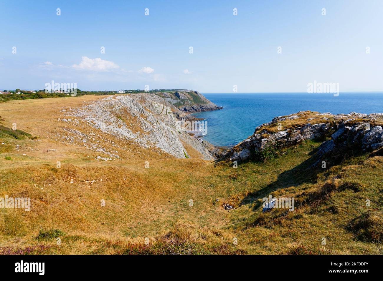 On rugged limestone clifftops looking towards Southgate on the Gower ...