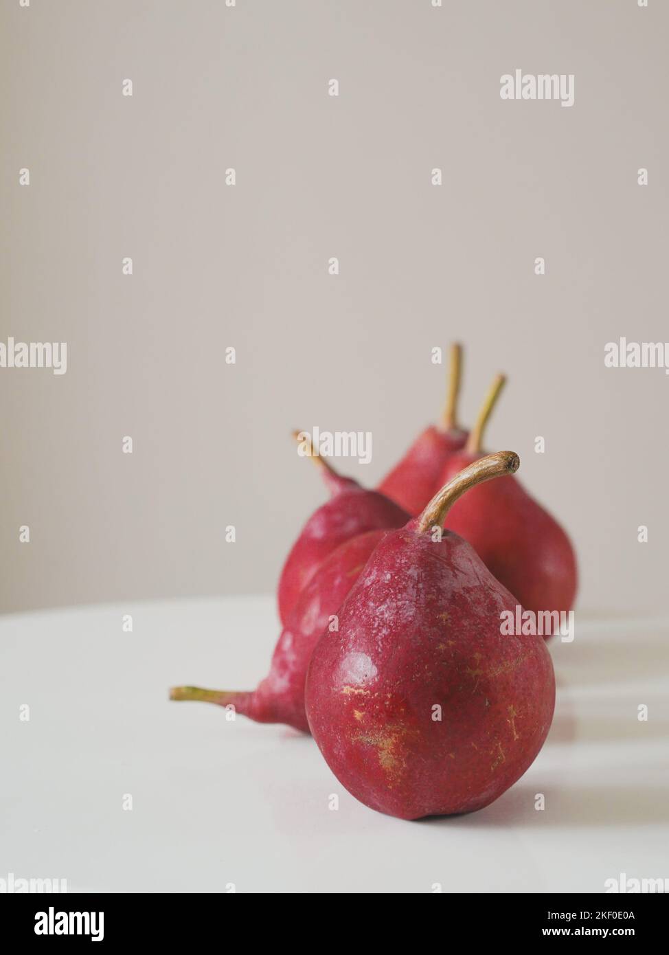 A vertical shot of ripe red pears Stock Photo - Alamy
