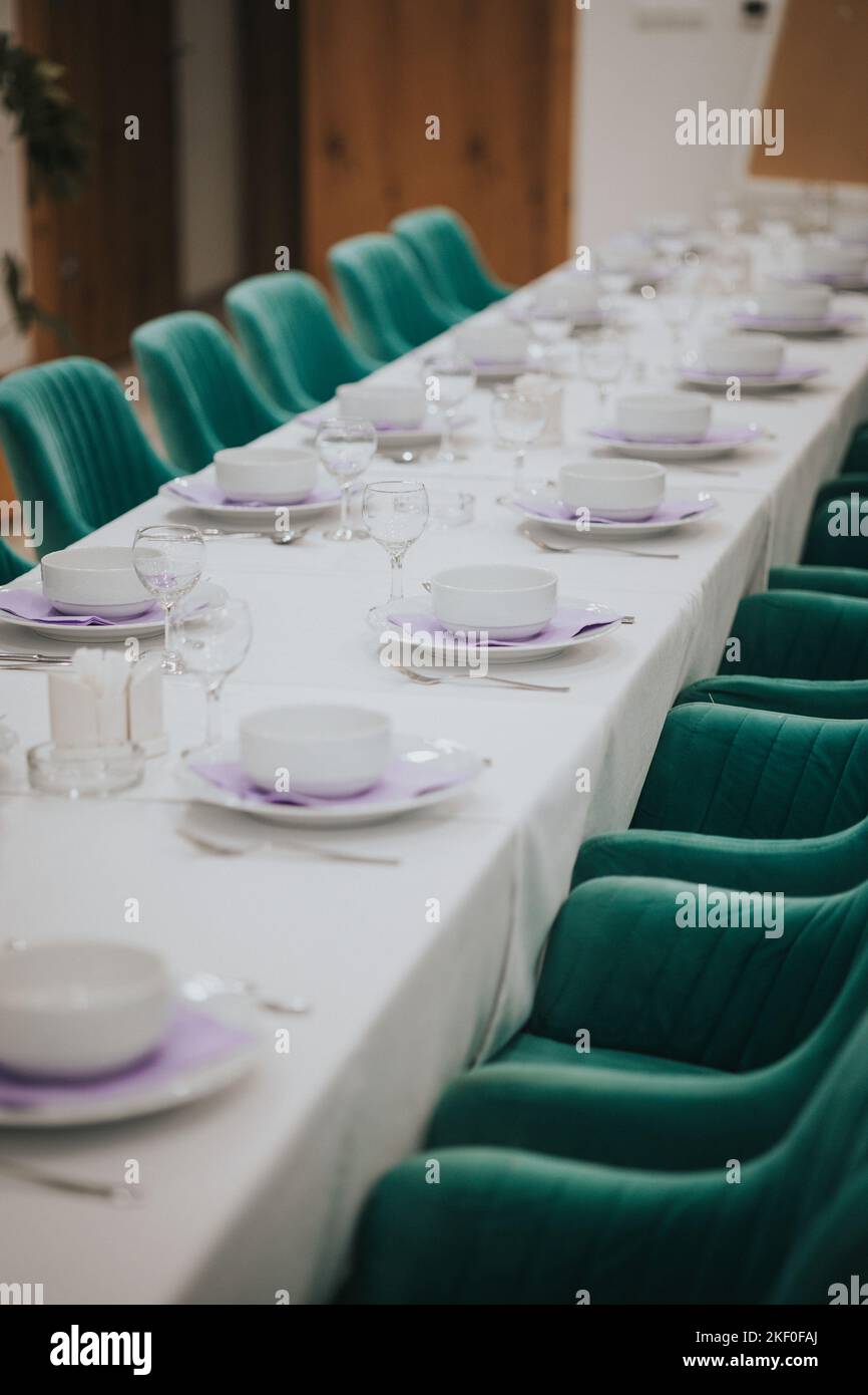 A vertical shot of an arranged table for an event Stock Photo - Alamy