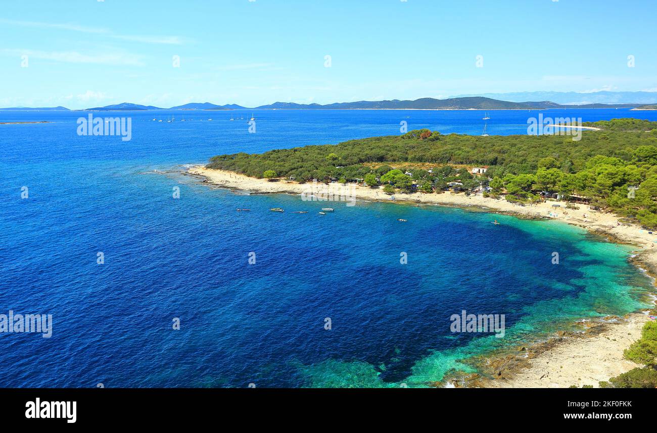 View to the clear blue Adriatic sea and beautiful beach from Veli Rat ...