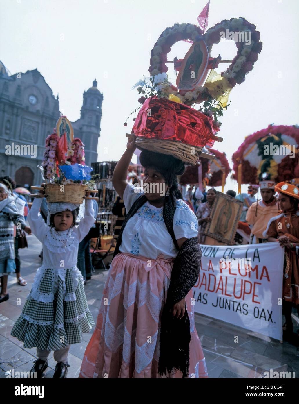 pilgrims and dancers on the day of the virgin of Guadalupe in the ...