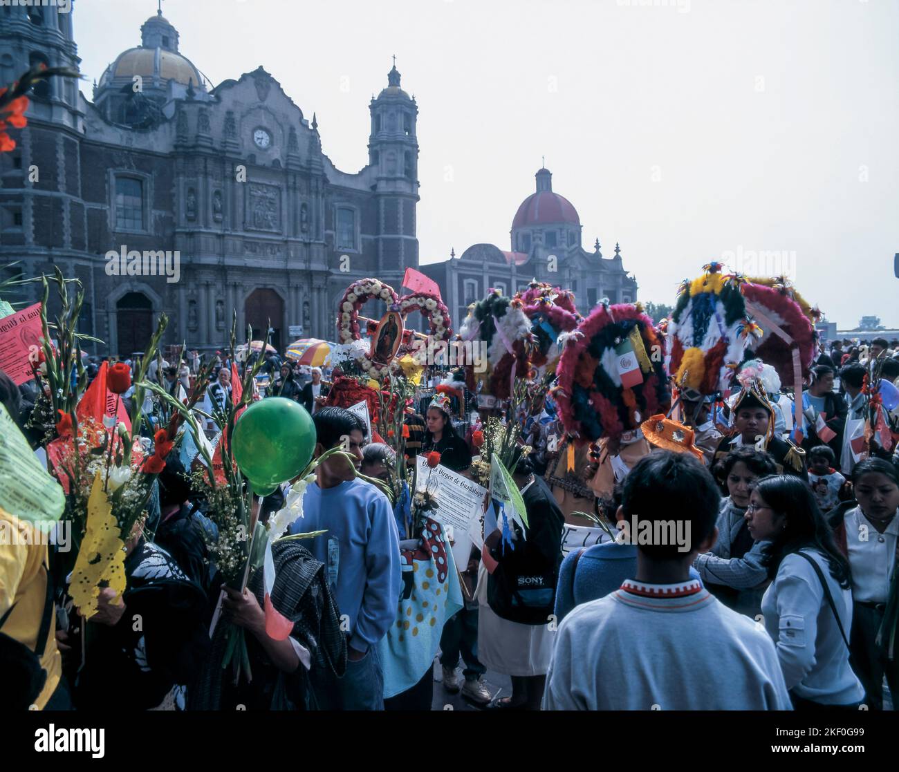 pilgrims and dancers on the day of the virgin of Guadalupe in the ...