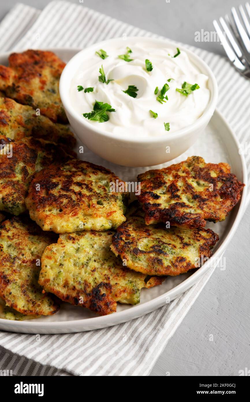 Homemade Broccoli Cheddar Fritters on a Plate, side view. Close-up ...