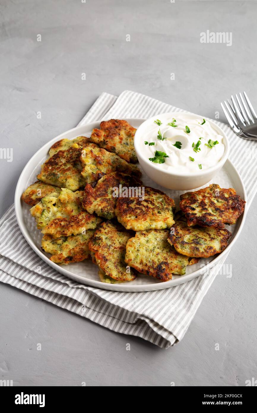 Homemade Broccoli Cheddar Fritters on a Plate, side view Stock Photo ...