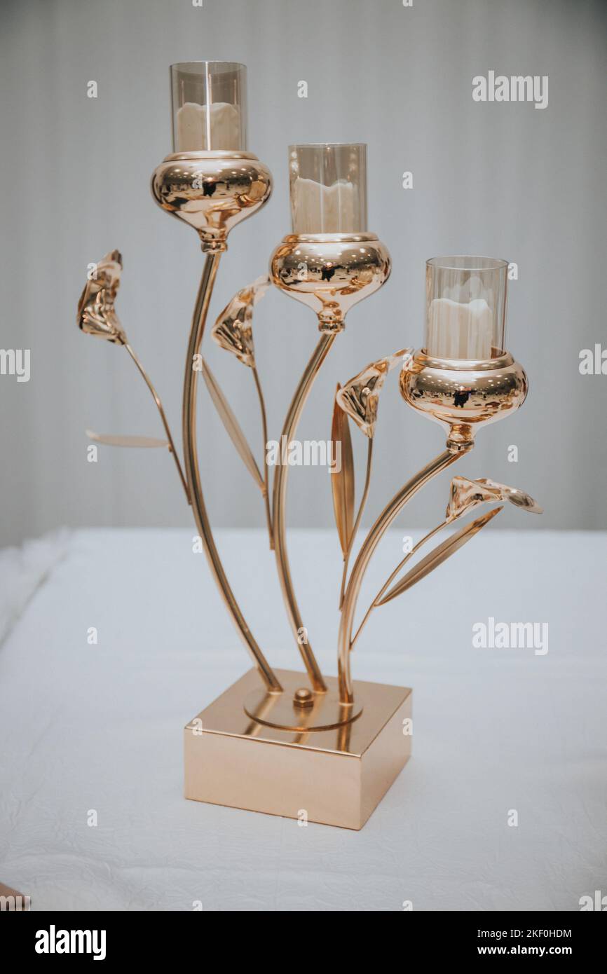 Golden candlestick hi-res stock photography and images - Alamy