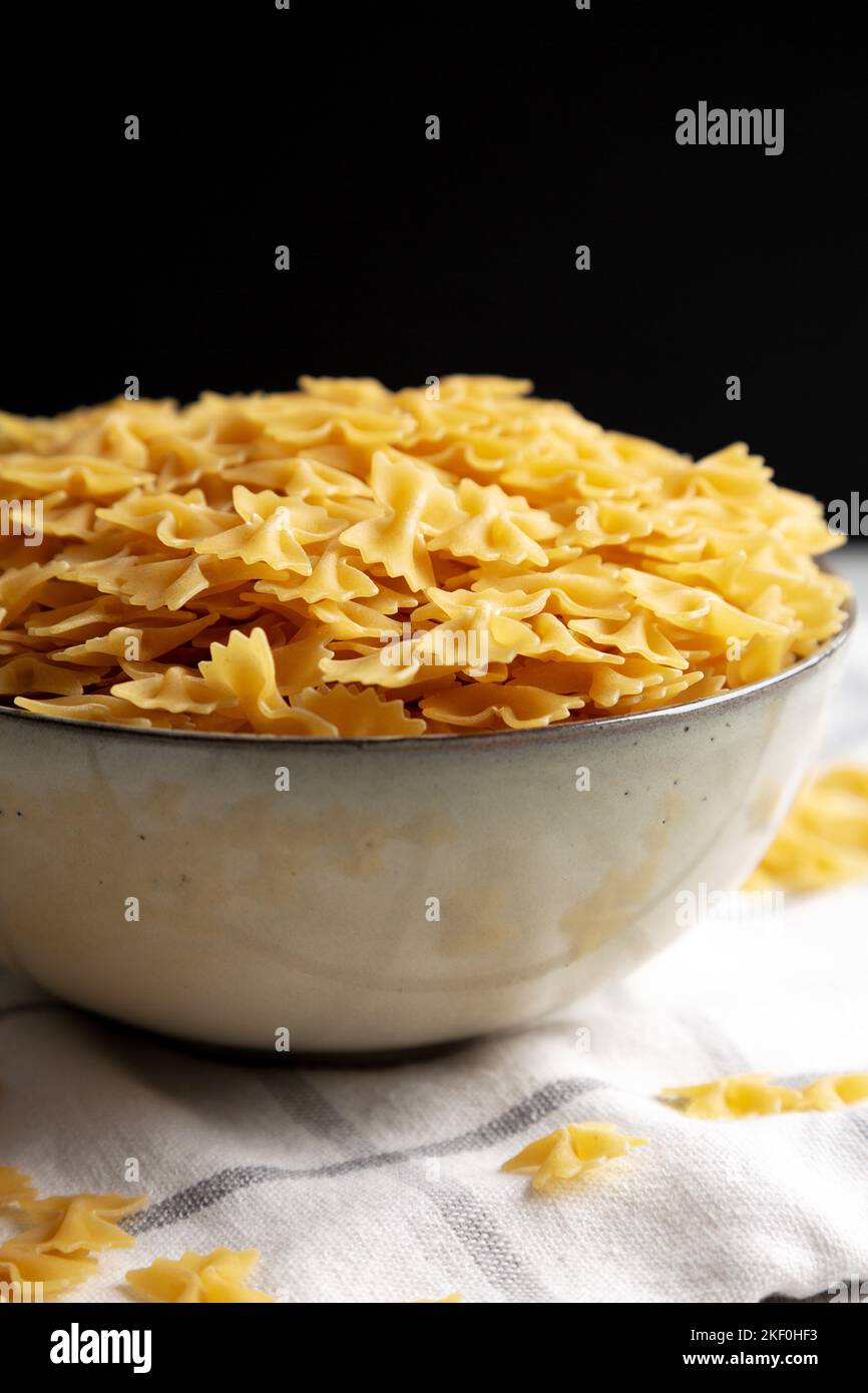 Dry Italian Mini Farfalle Pasta Ready to Cook. Close-up Stock Photo - Alamy