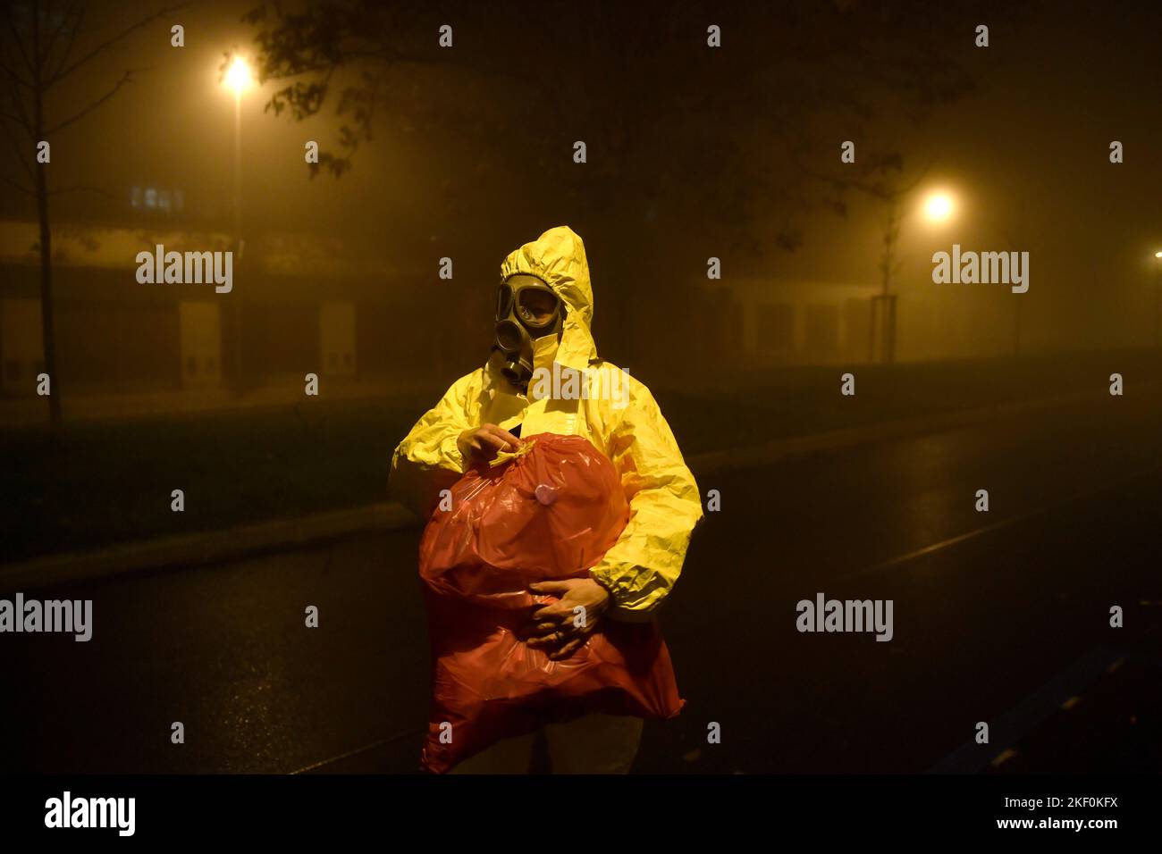 Man wear trash bag hi-res stock photography and images - Alamy