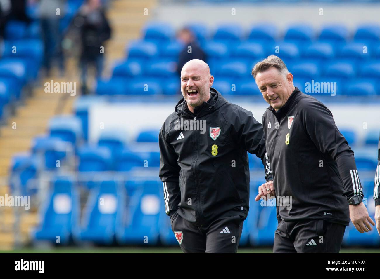 Cardiff, Wales, UK. 15th Nov, 2022. Team coach Rob Page shares a joke ...