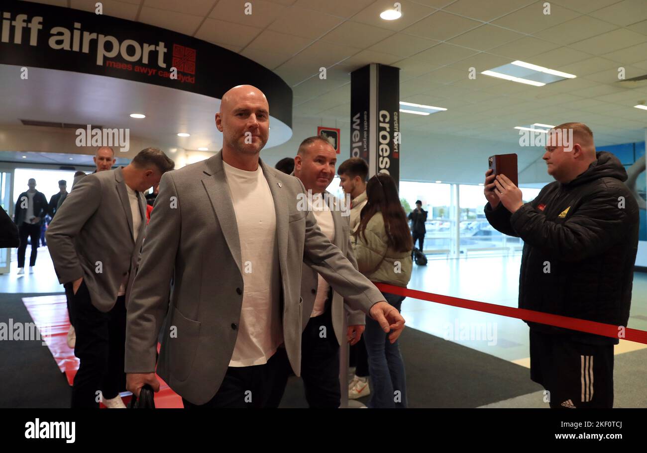 Fans greet Wales manager Rob Page at Cardiff airport as they prepare to ...
