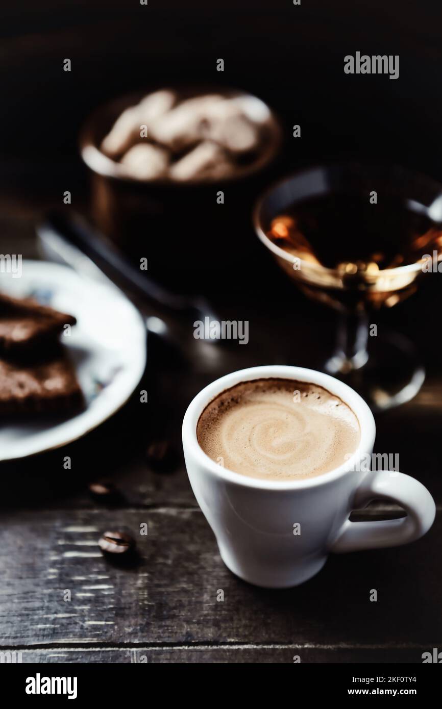 Cup of coffee on rustic wooden background. Soft focus. Close up Stock ...