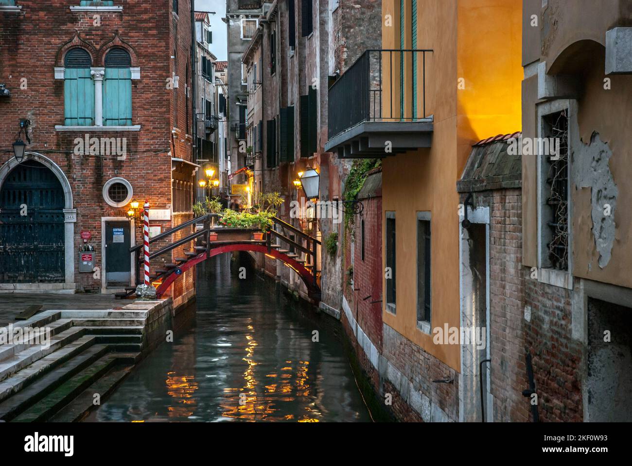 Small bridge over a narrow canal in Venice Stock Photo - Alamy