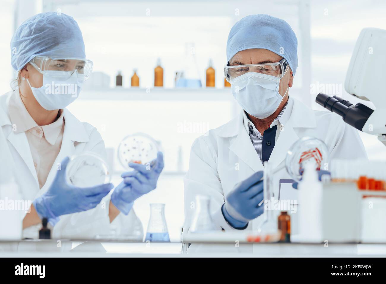 Microbiology scientists studying a new type of bacteria . science and health Stock Photo - Alamy