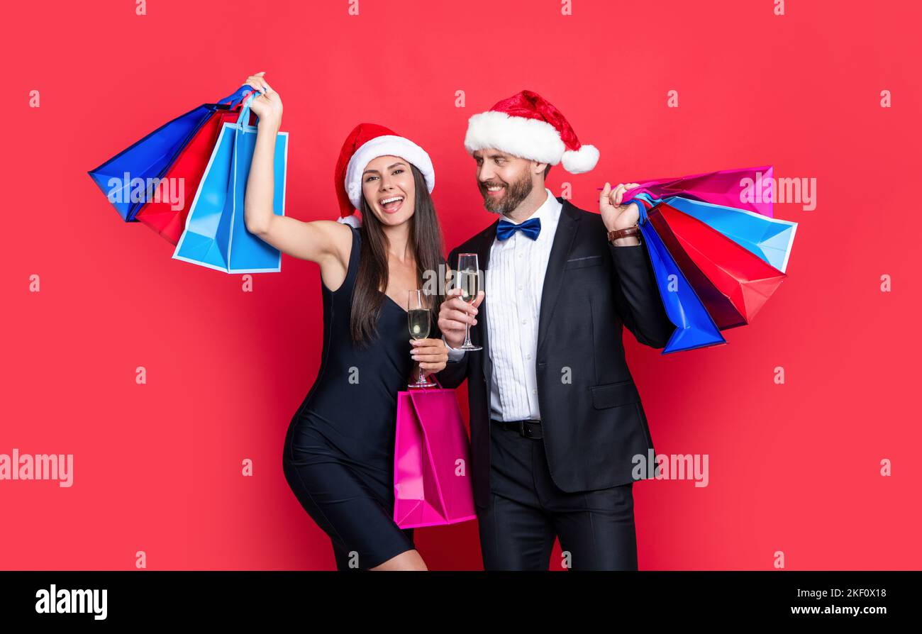 happy shopping couple at new year sale. new year couple on shopping ...