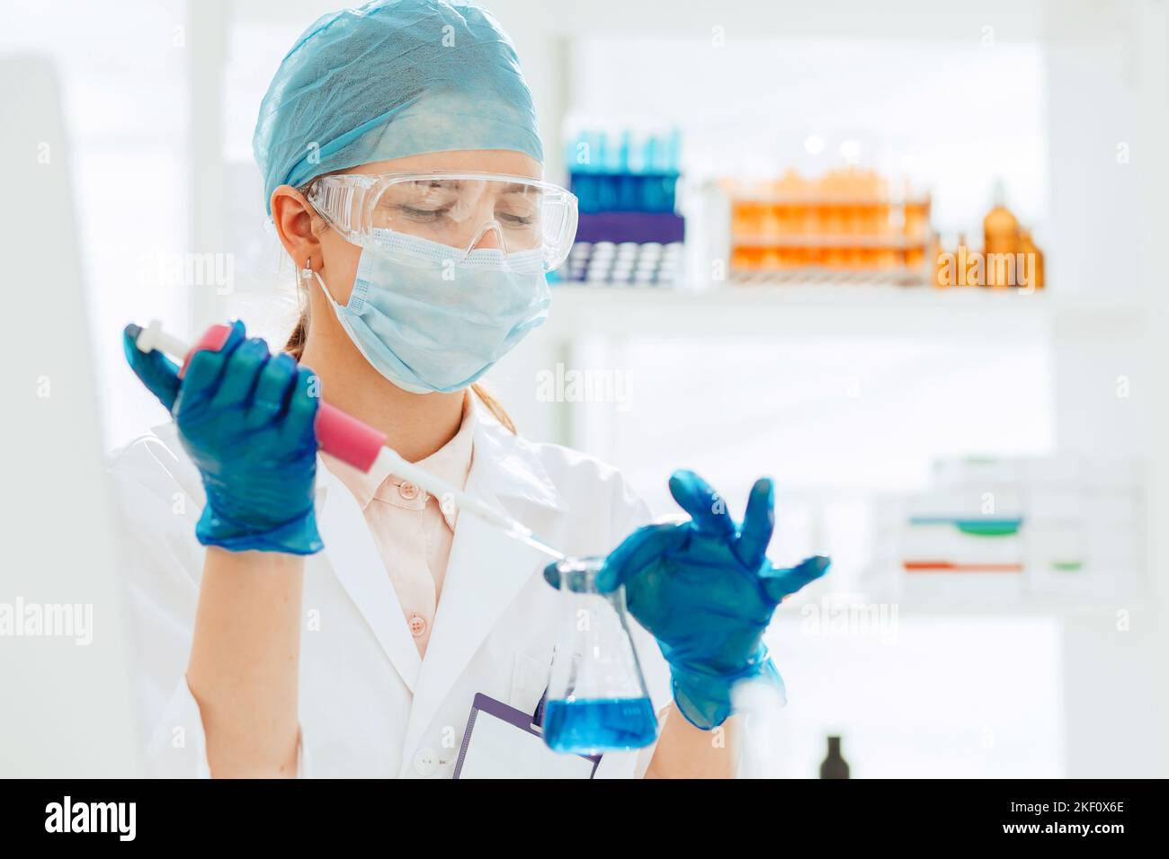 Research chemical laboratory assistant hi-res stock photography and ...