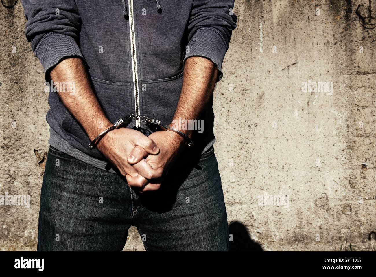 Handcuffed man hi-res stock photography and images - Alamy