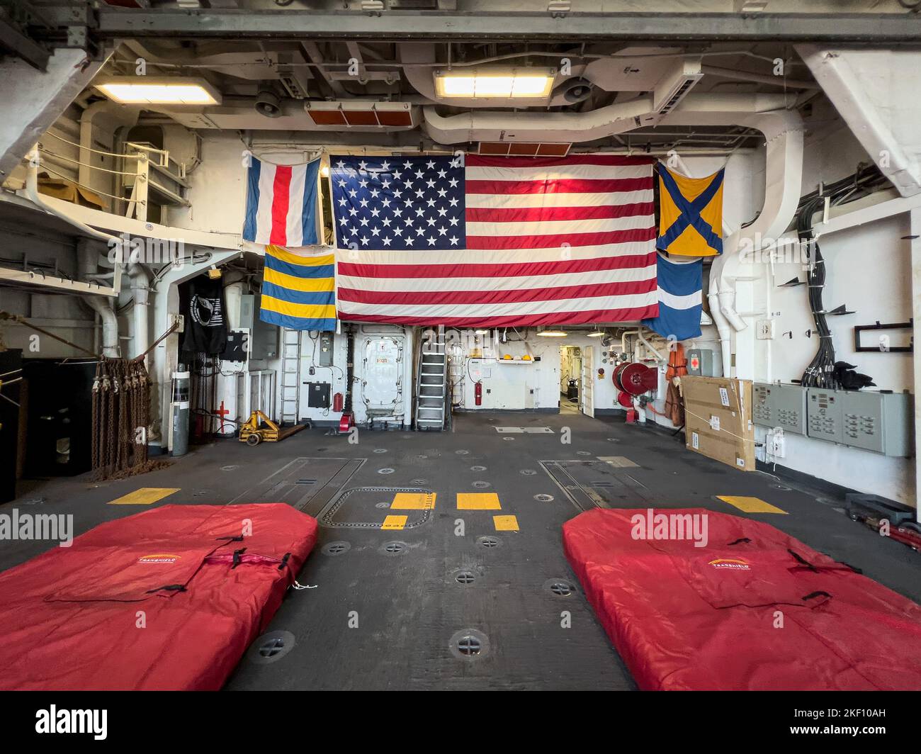 An American Flag in a hangar on United States Navy ship during Fleet ...