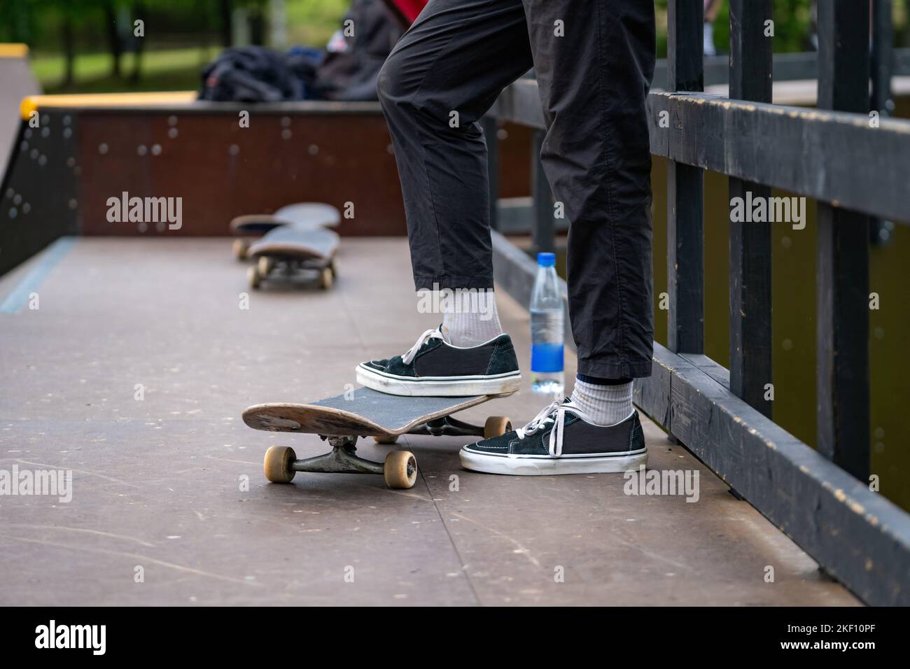 Close up of a skater standing on the ramp at extreme sport competition ...