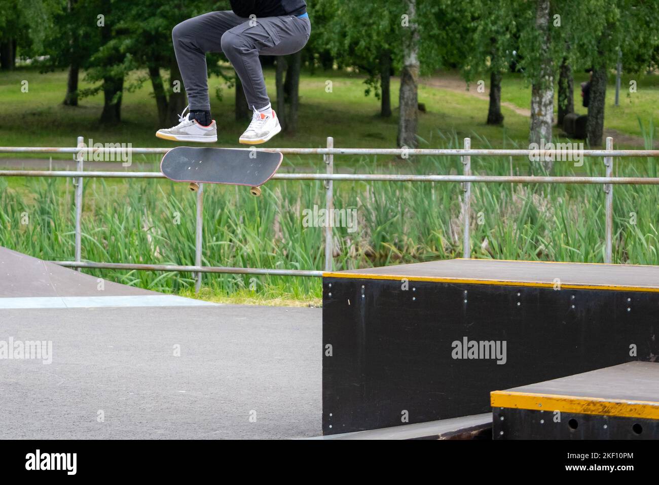 Close up of a skater jumping on a ramp at extreme sport competition ...