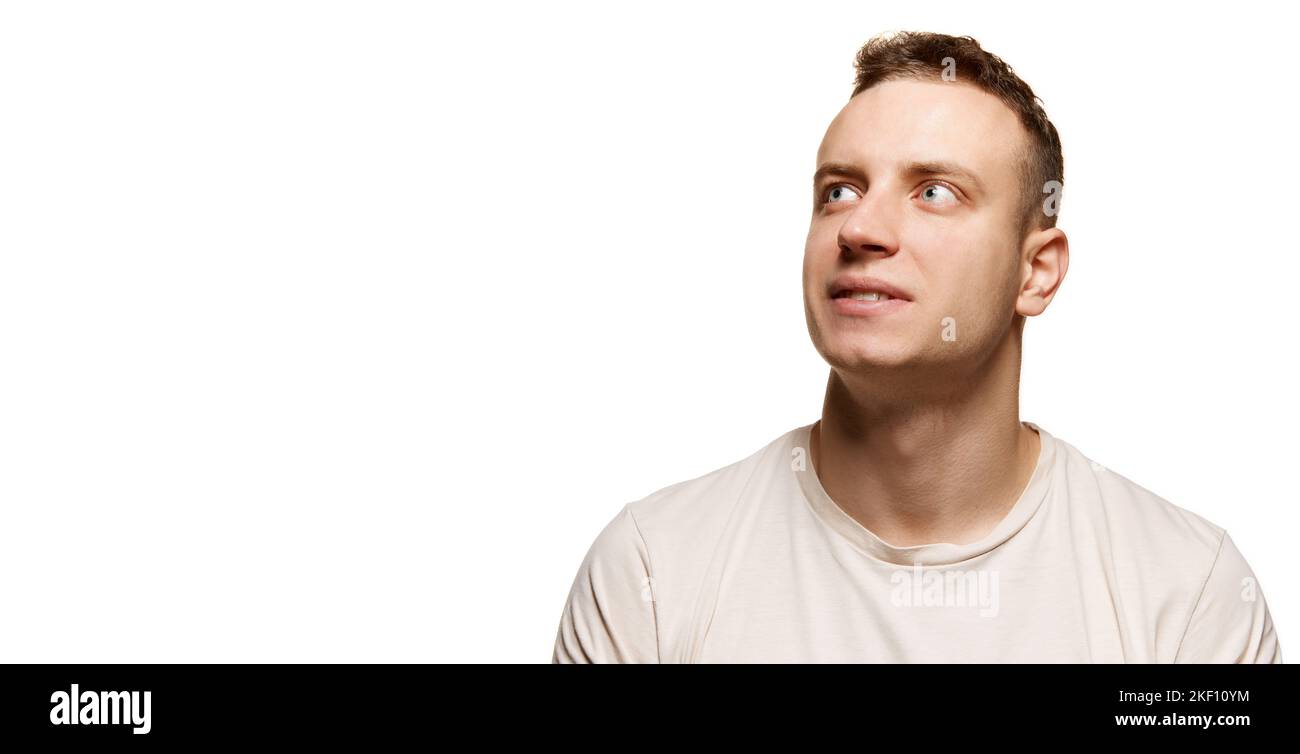 Portrait of young man with smooth shaved face isolated over white ...