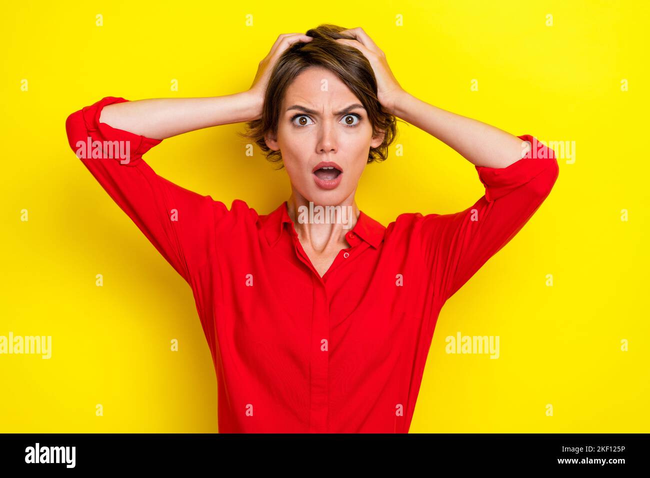 Portrait of impressed lady hands touch head open mouth cant believe ...