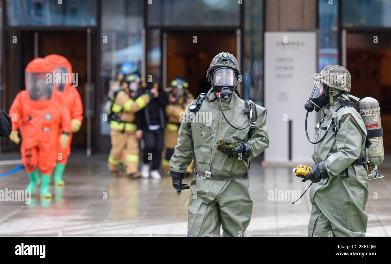 A military team is conducting patient classification and transfer ...