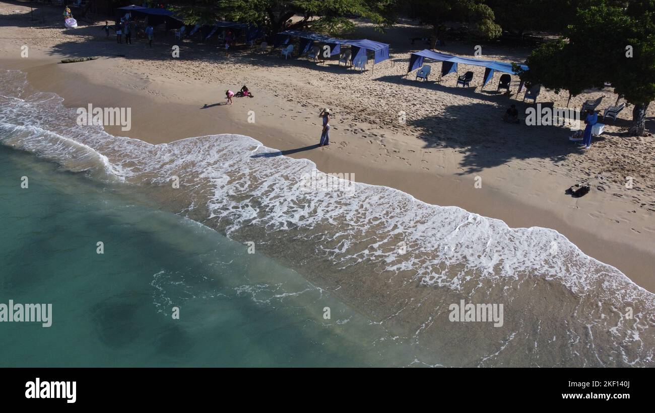 The people on a sandy beach Stock Photo - Alamy