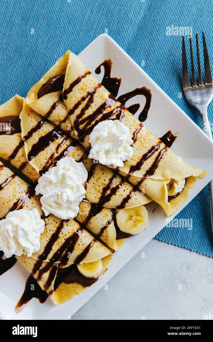 a vertical high angle shot of Banana Chocolate Crepes Stock Photo - Alamy