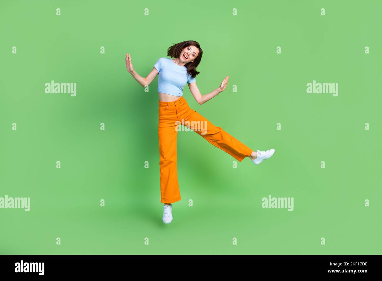Full length photo of cheerful gorgeous person jumping have good mood ...
