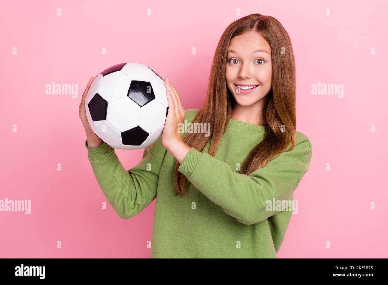 Photo of excited pretty school girl dressed green sweatshirt rising ...