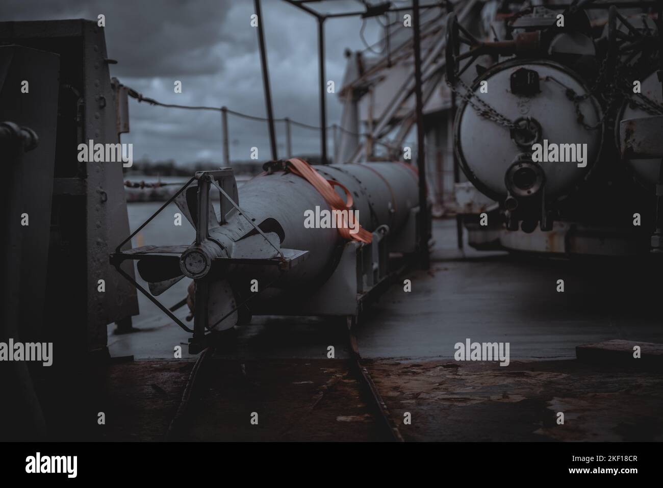A torpedo laying on the deck of the destroyer HMS Smaland J19 docked in ...