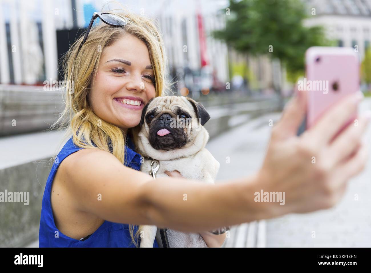 Carrying a pug hi-res stock photography and images - Alamy