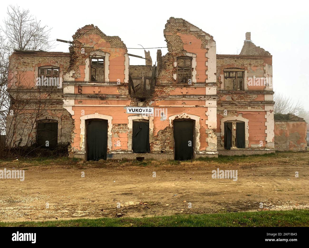 A horizontal image of an Old severely damaged Train Station in Vukovar ...