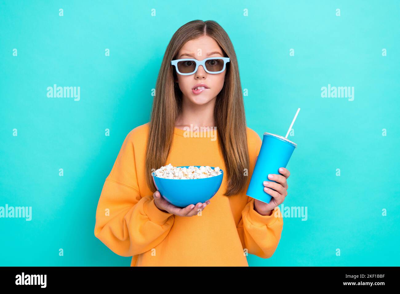 Photo of cute teenager girl brown long hair hold popcorn drink soda ...
