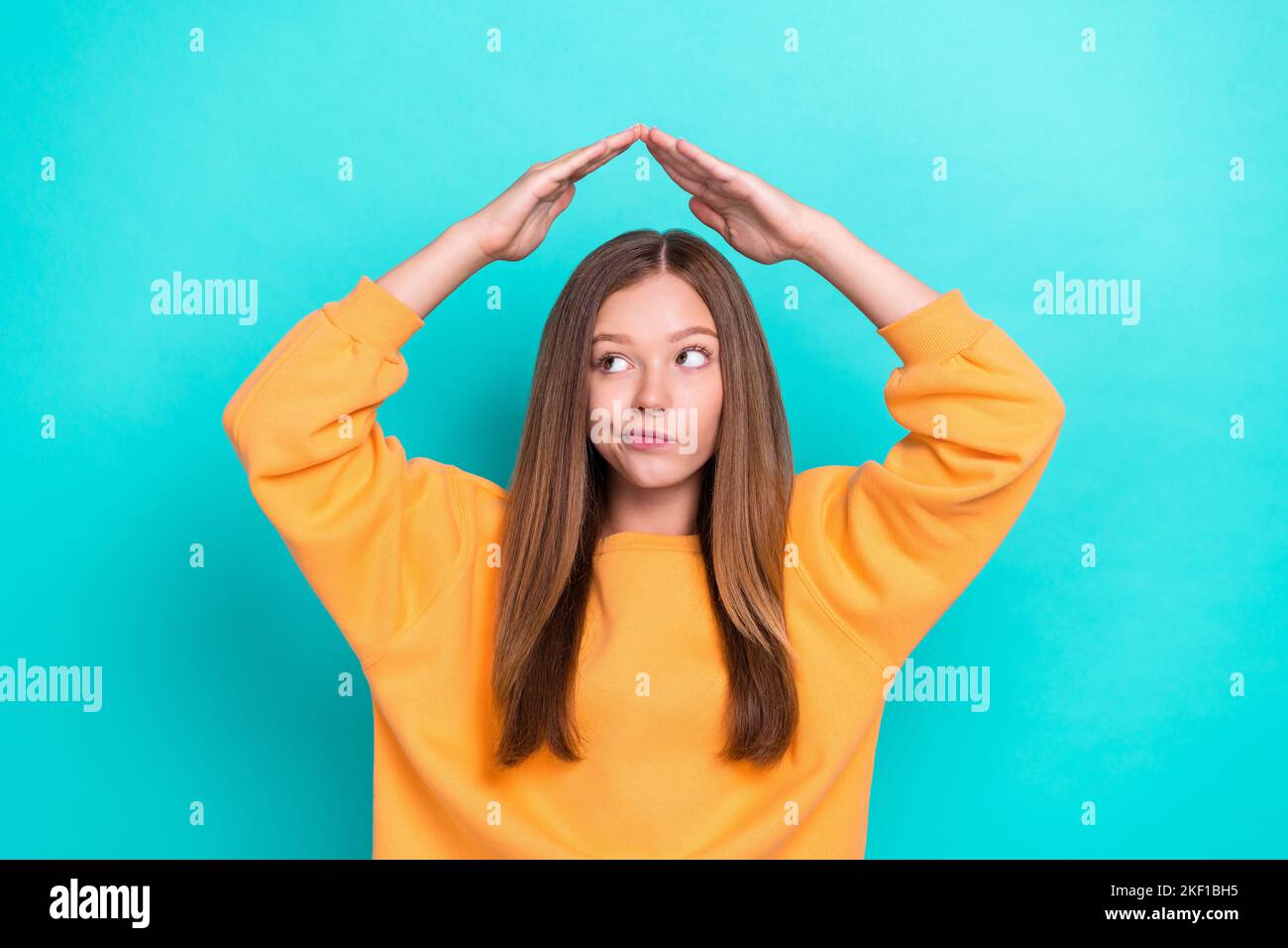 Photo of young funny cute teenager lady minded thinking looking empty ...