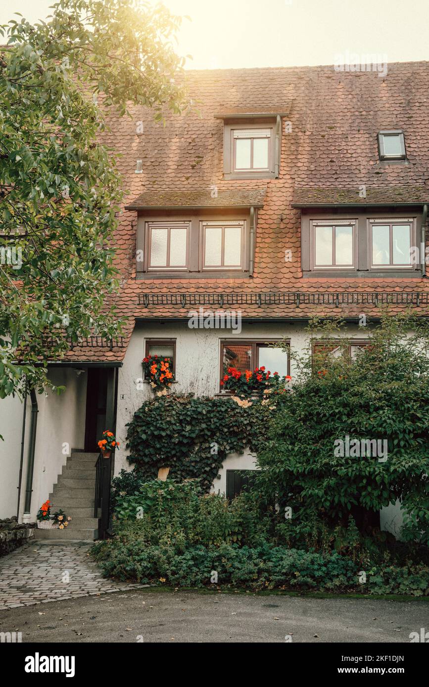 Traditional small house with beautiful outdoor decor facade in Germany ...