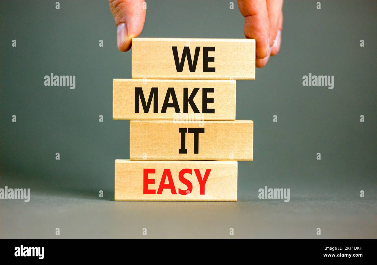 We make it easy symbol. Concept words We make it easy on wooden cubes ...